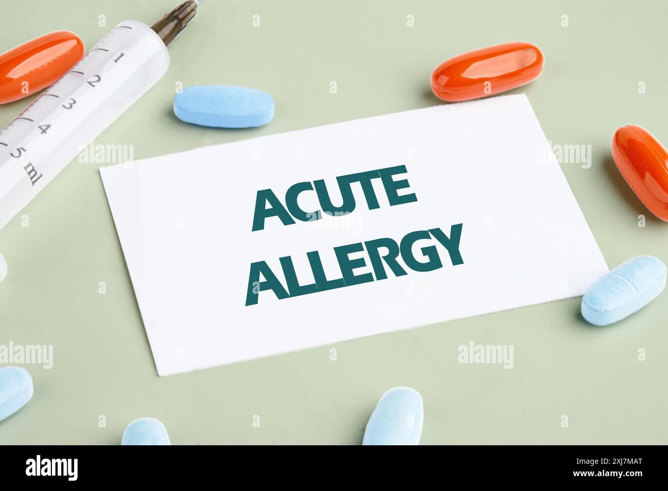 Medical concept. The inscription ACUTE ALLERGY on a white business card ...