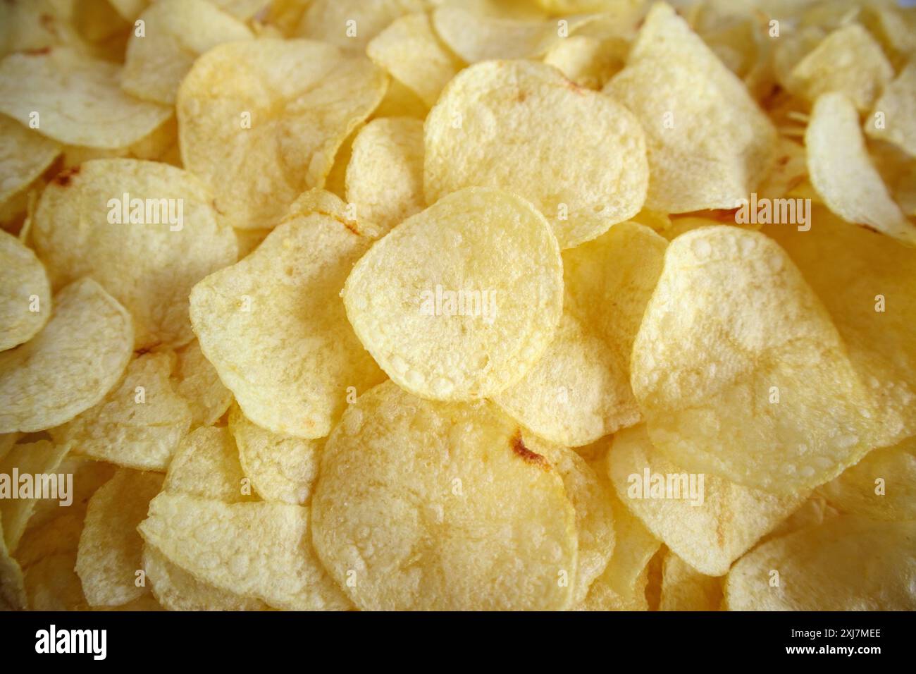 crispy potato chips snack texture background Stock Photo - Alamy