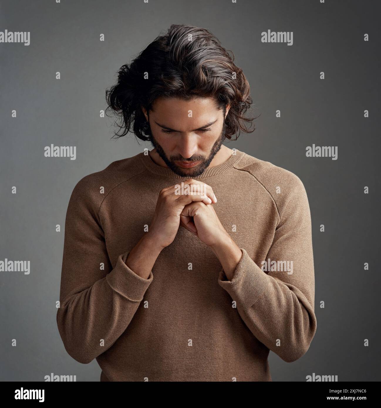 Spiritual, man and praying with faith, religion and person on grey ...