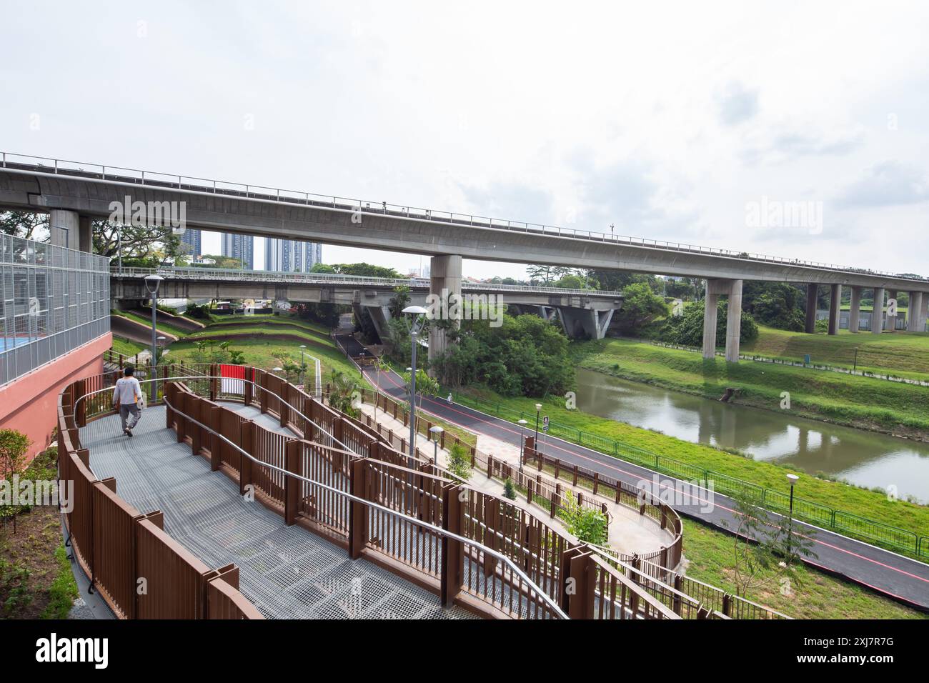 Walkway design at a housing area. A running pavement beside the massive ...