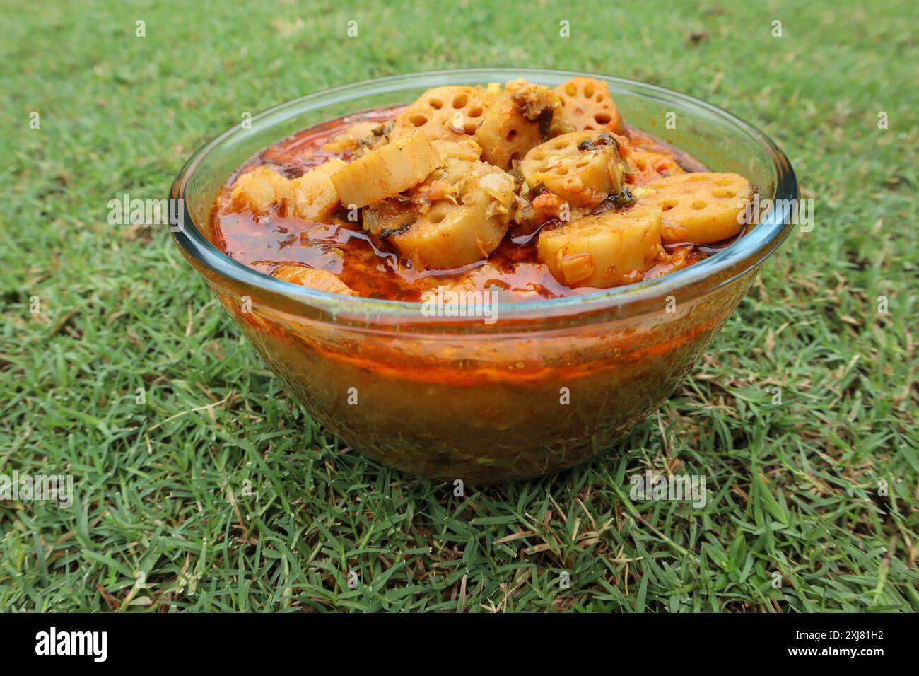 Lotus stem curry, a side dish made with lotus stem. Kamal kakdi ki ...
