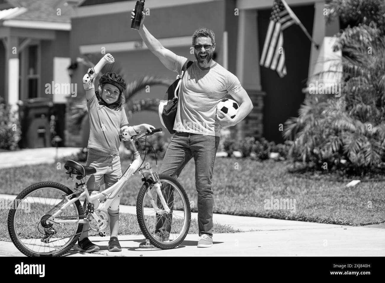 Father and son sharing biking adventure. father and son navigate the ...