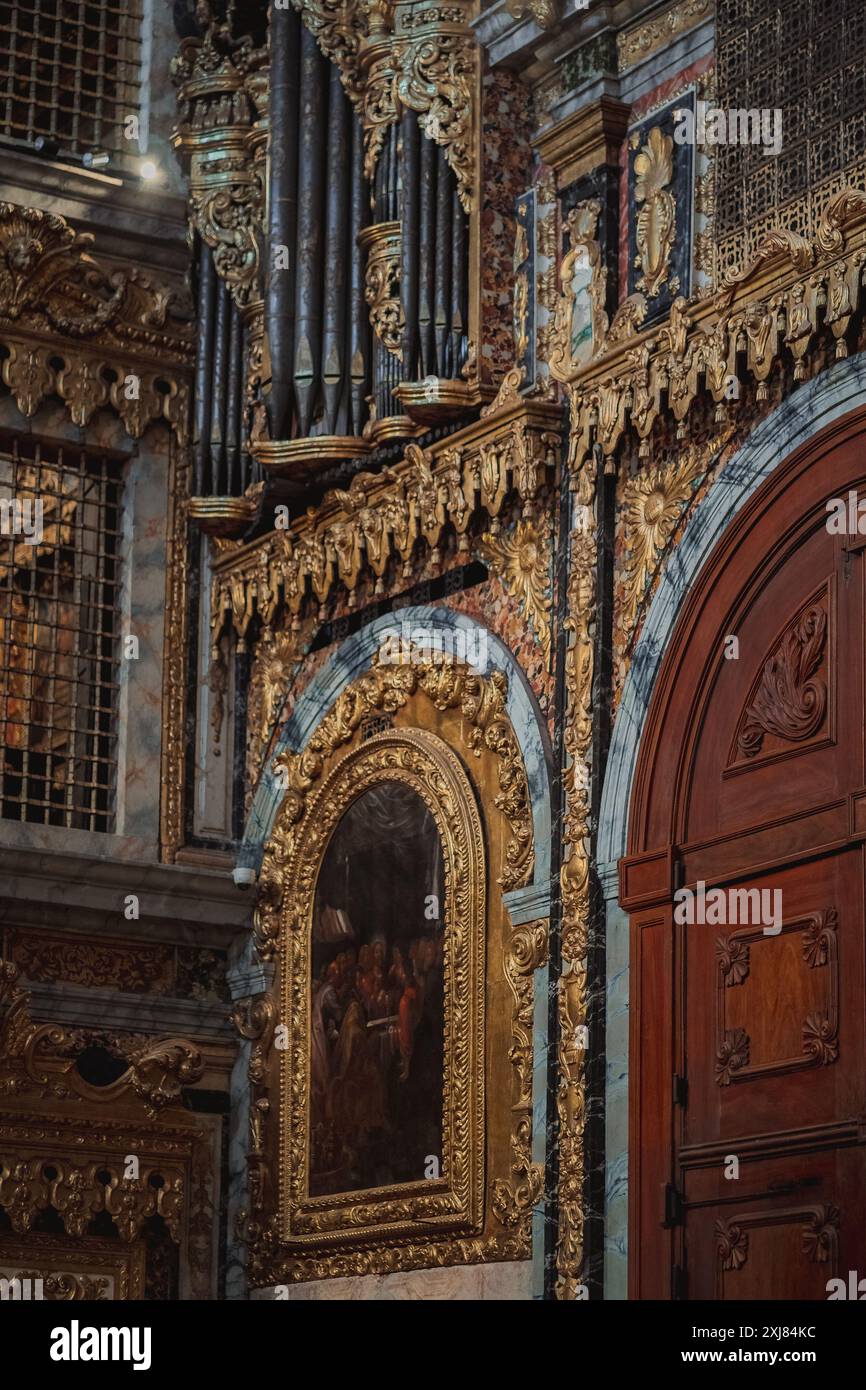 The church features a door and a painting hanging on the wall Stock ...