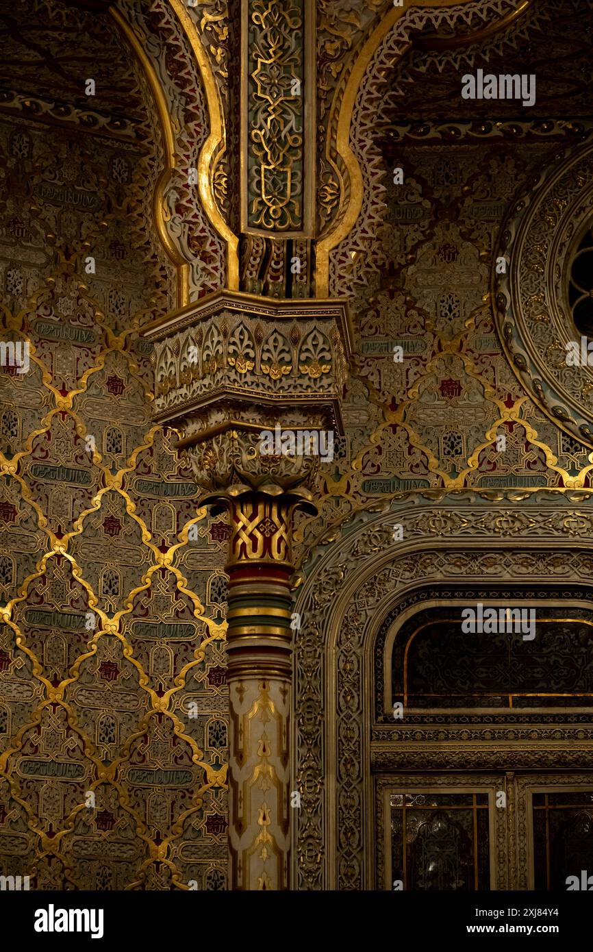 The building is ornate with columns, windows, wood art, and symmetry ...