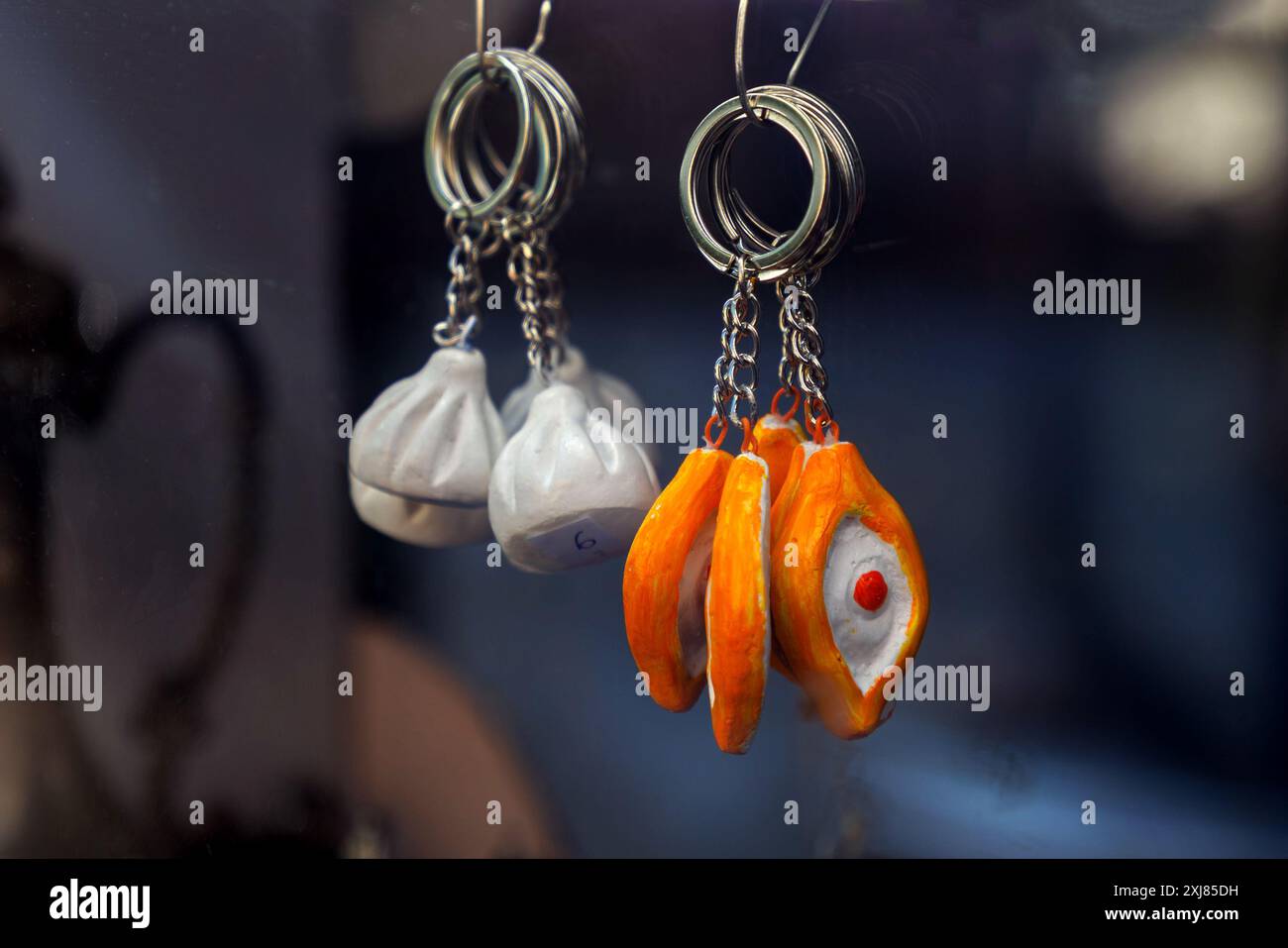 Tbilisi, Georgia - 24 JUNE, 2024: Touristic keychain souvenirs shaped ...
