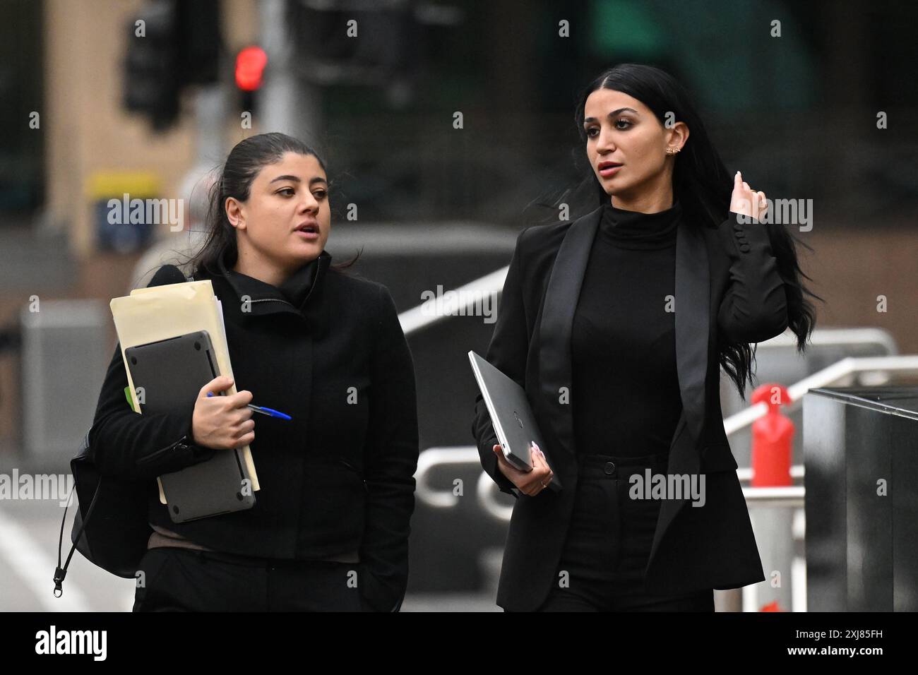 **HOLD SUPPRESSION** Rachelle Badour-Taha (right) departs from the ...