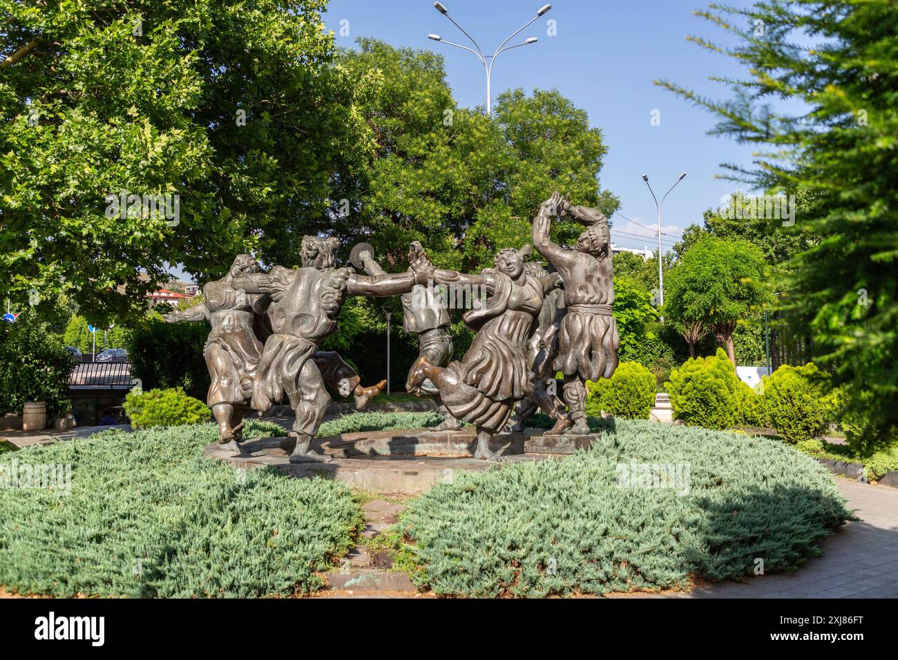Tbilisi, Georgia - 24 JUNE, 2024: Bronze statue of folkloric dancers ...
