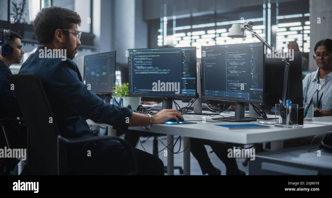 Team of Talented Young Indian Professionals Working in a Technological ...