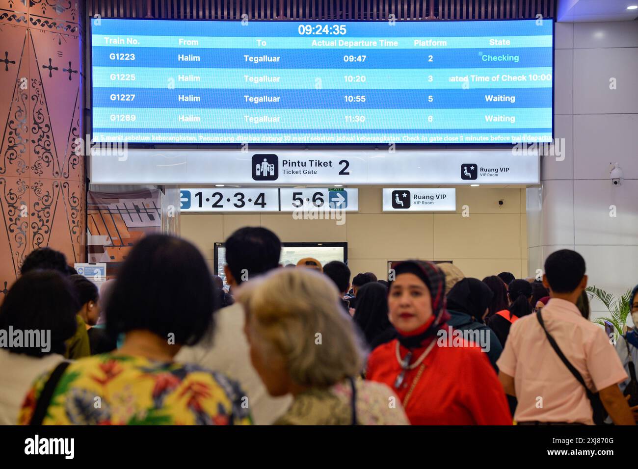Jakarta, Indonesia. 17th July, 2024. People line up before checking in at the waiting hall of ...