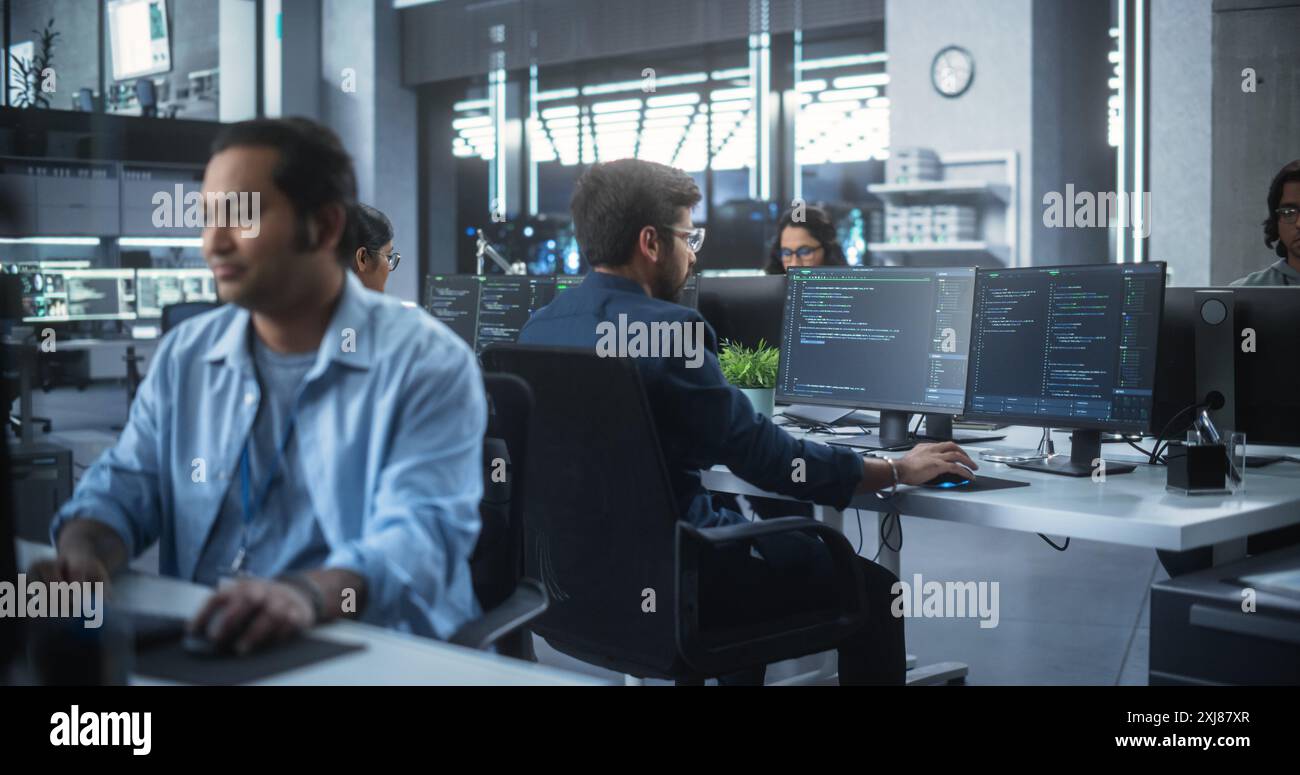 Team of Talented Young Indian Professionals Working in a Technological ...