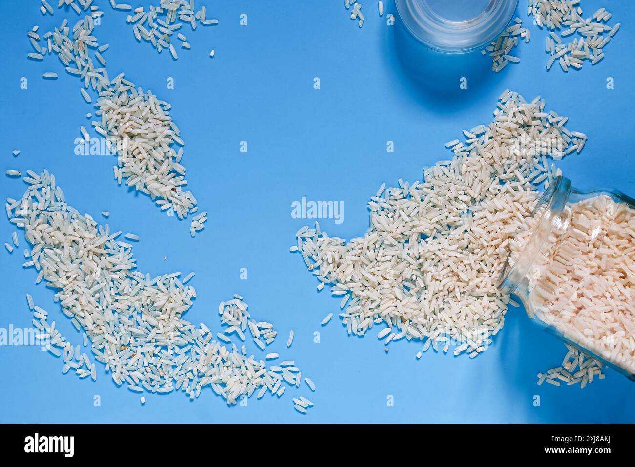 Rice arranged in the shape of a map of Malaysia with a blue background ...