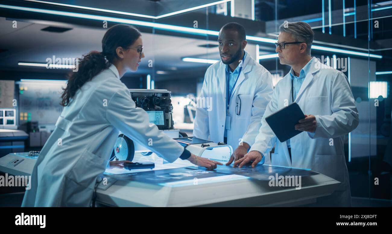 Portrait of a Team of Industrial Engineers Working on a Mobility Robot ...