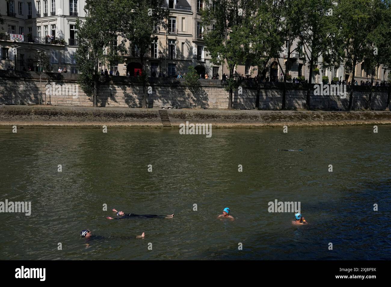 People swim in the Seine river after Mayor Anne Hidalgo swam in the ...