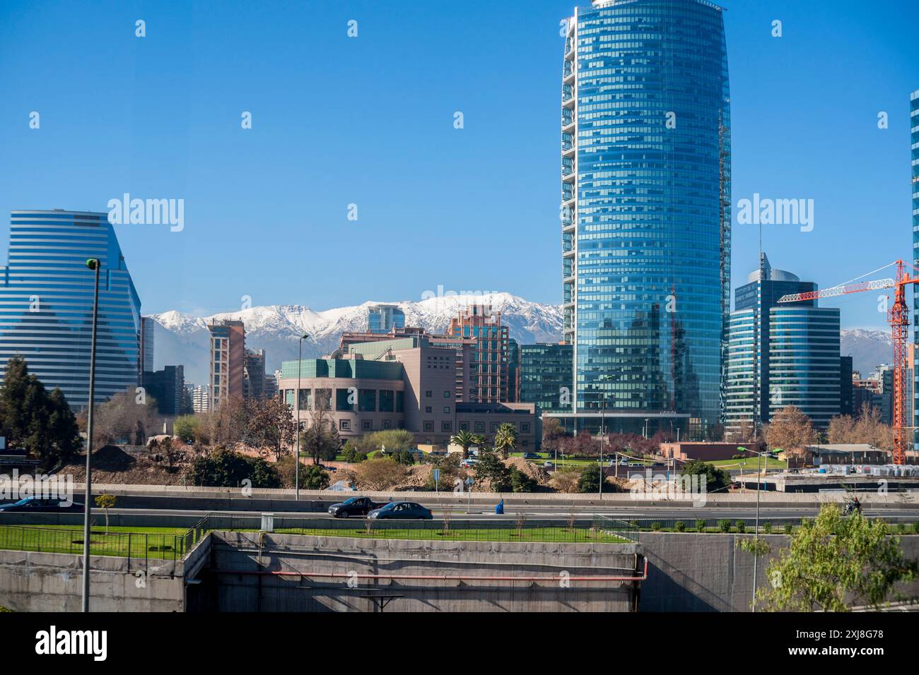 Santiago modern high-rise buildings and snow capped Andes mountains ...
