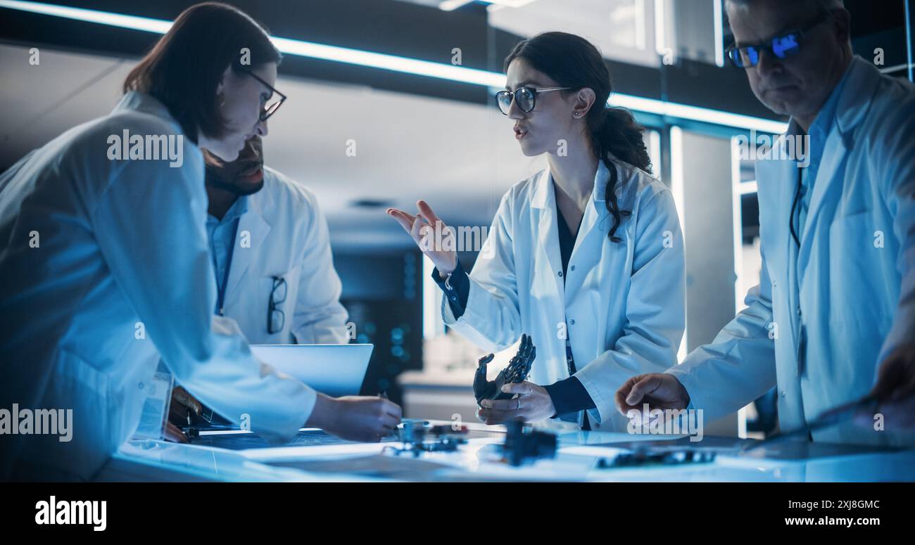 Robotics engineers working humanoid robot hi-res stock photography and ...