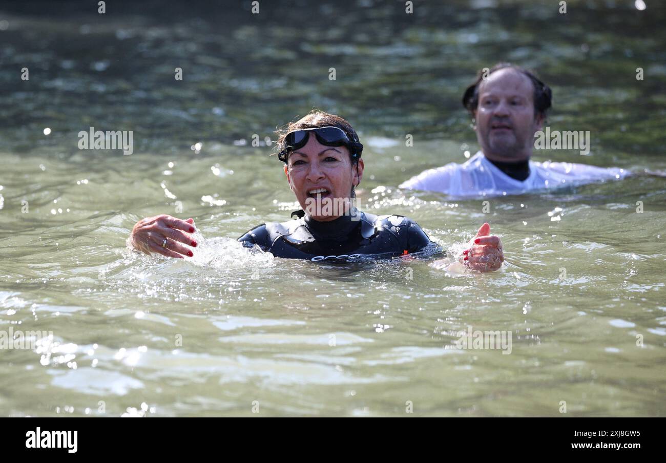 After months of anticipation, Paris Mayor Anne Hidalgo swims in the ...