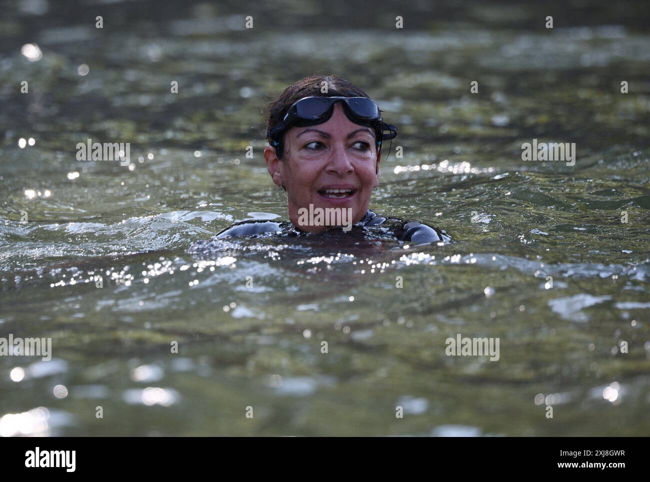 After months of anticipation, Paris Mayor Anne Hidalgo swims in the ...
