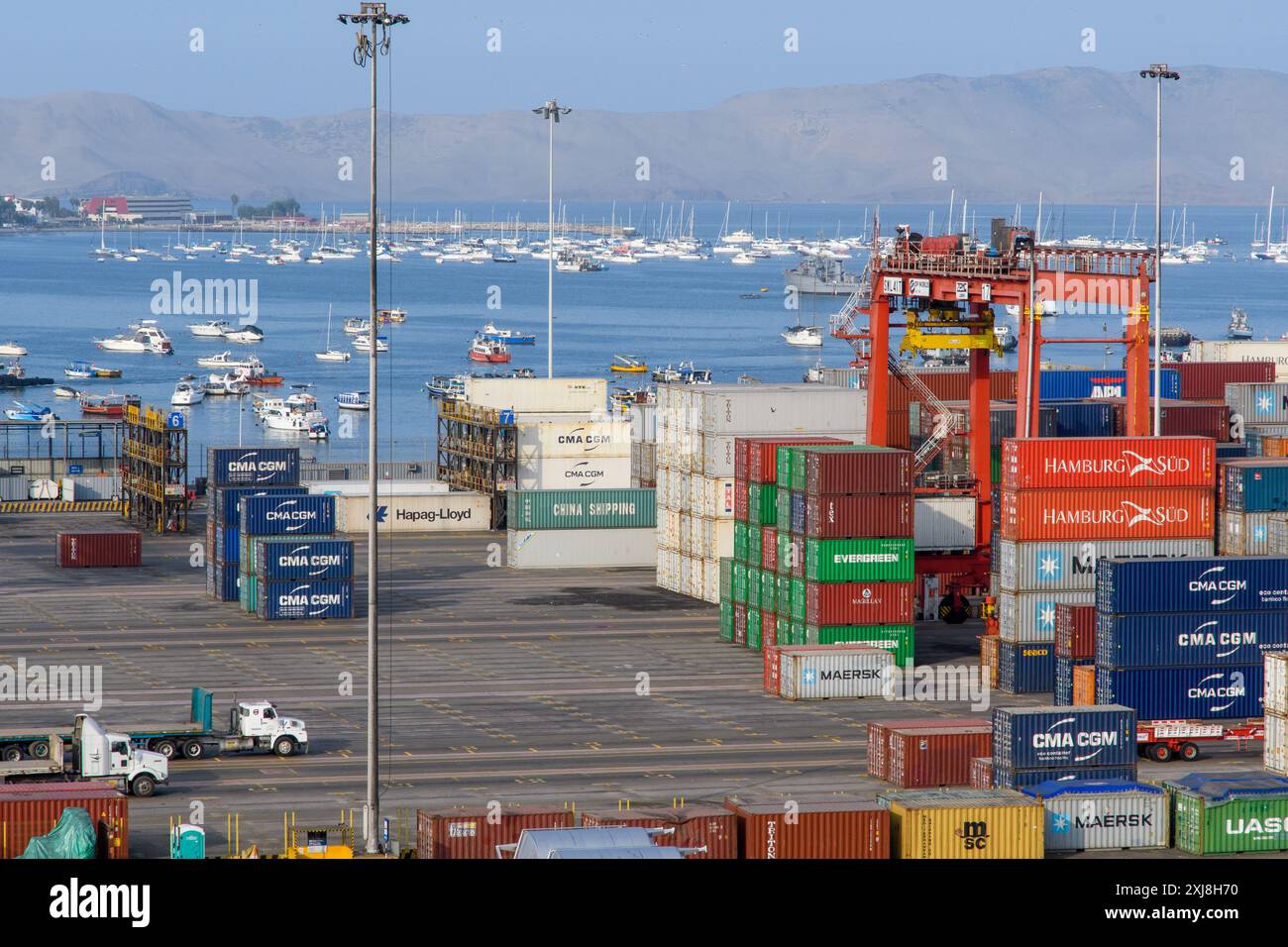 Callao, Peru - March 20, 2019: Bustling port activity with stacked ...