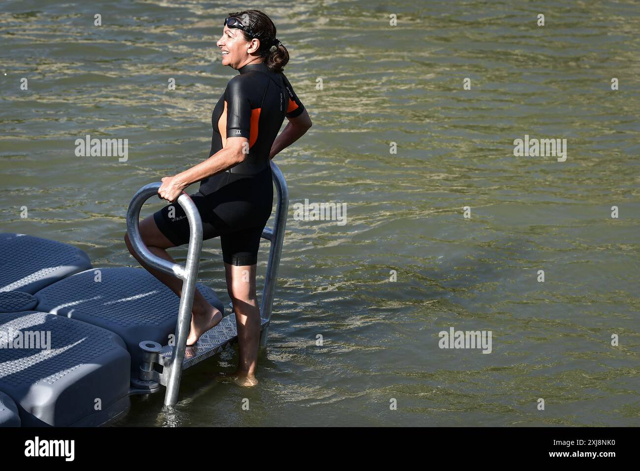 Paris, France. 17th July, 2024. Mayor of Paris Anne Hidalgo swims in ...