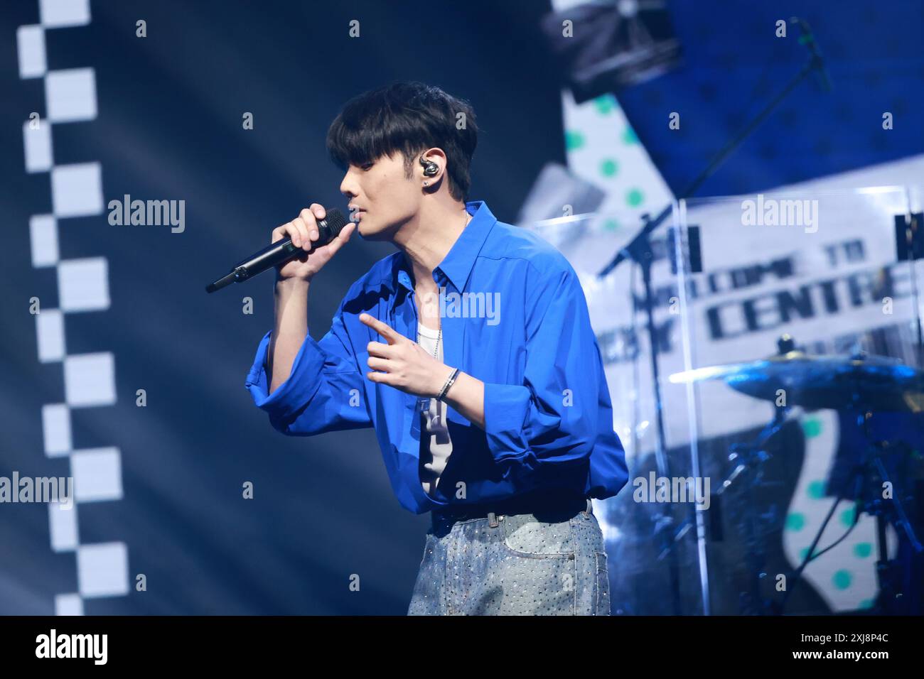 Chinese singer-songwriter, actor and producer Li Ronghao attends an ...