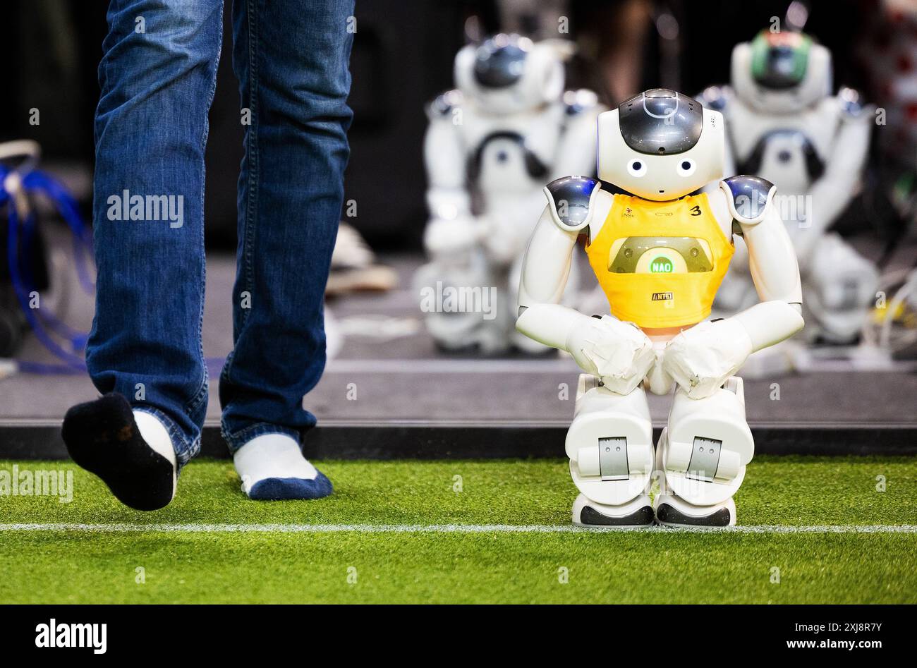 EINDHOVEN - Robot on the football field during a practice day in the ...