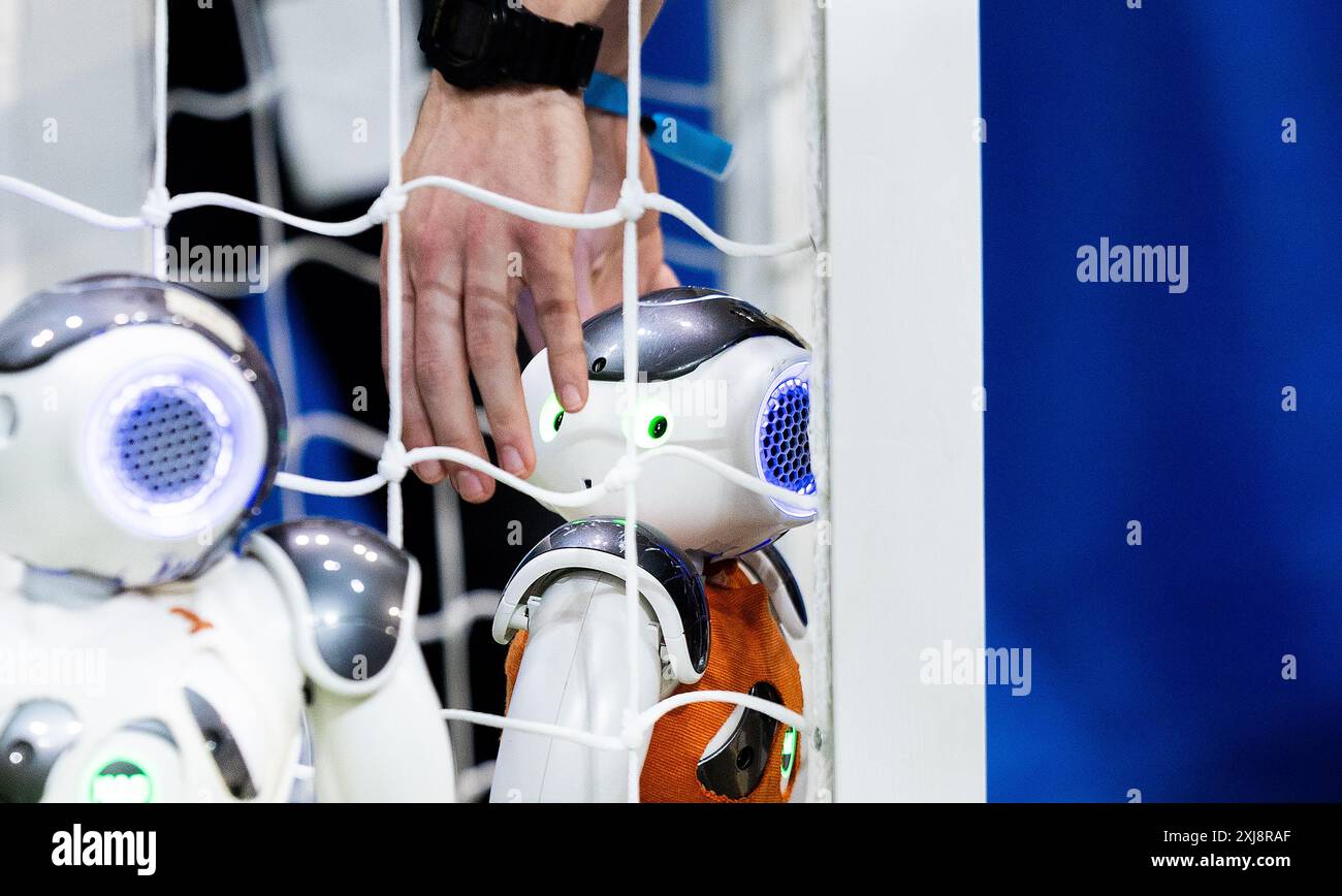 EINDHOVEN - Robots on the football field during a practice day in the ...