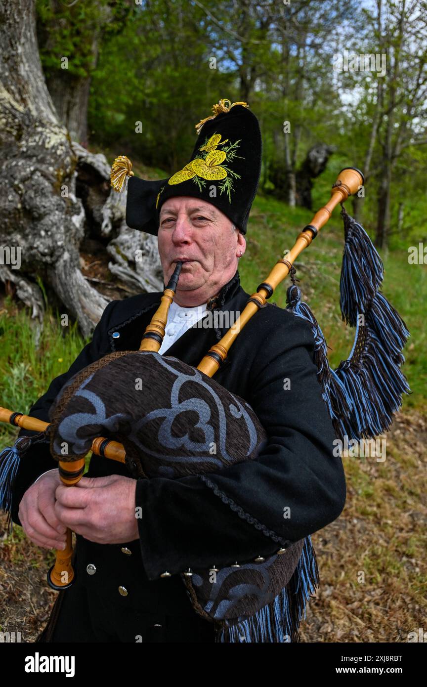 A traditional Gaiteiro from Galicia, dressed in classic attire with a ...