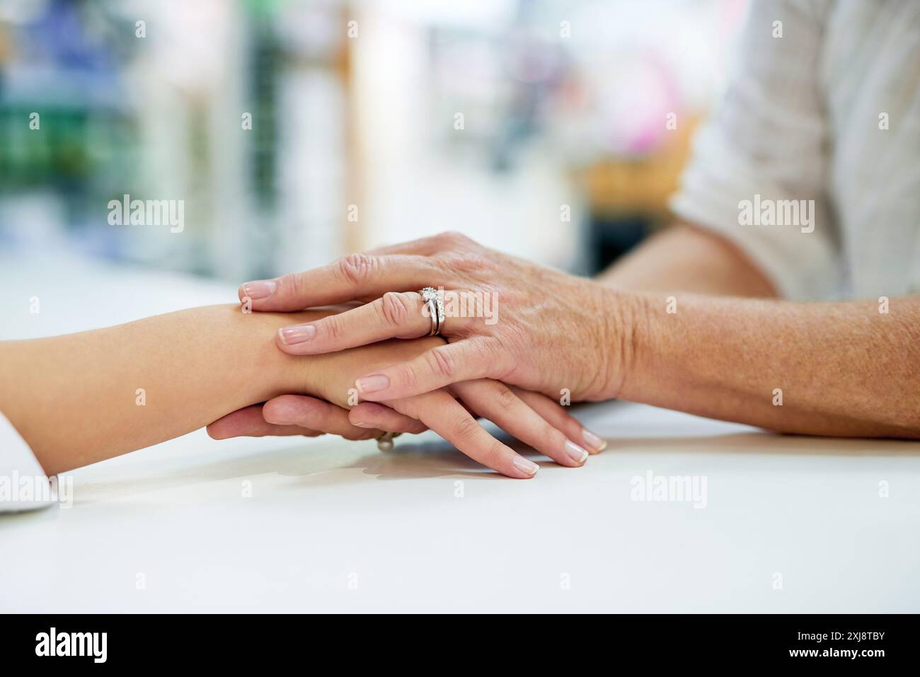 Pharmacist, woman and holding hands with support for healthcare with ...