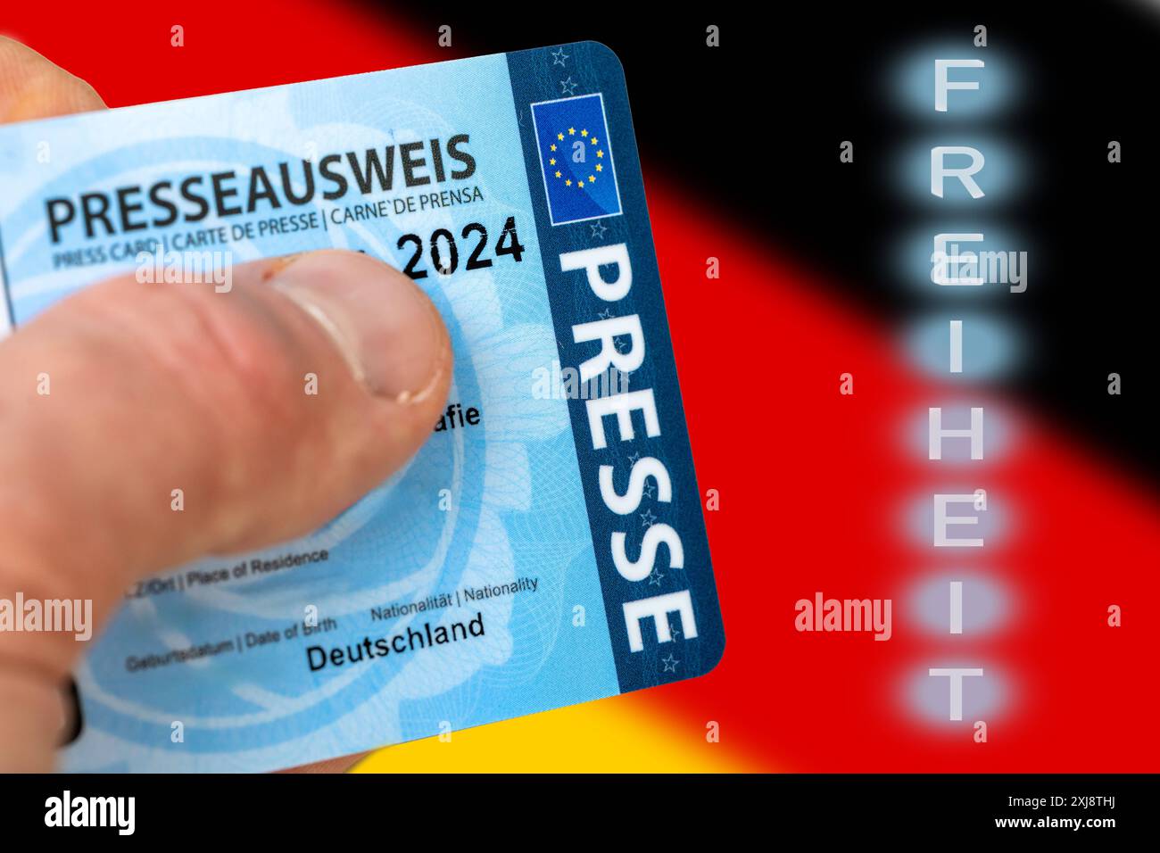 July 17, 2024: Symbolic image of the Compact magazine ban. Hand holding ...