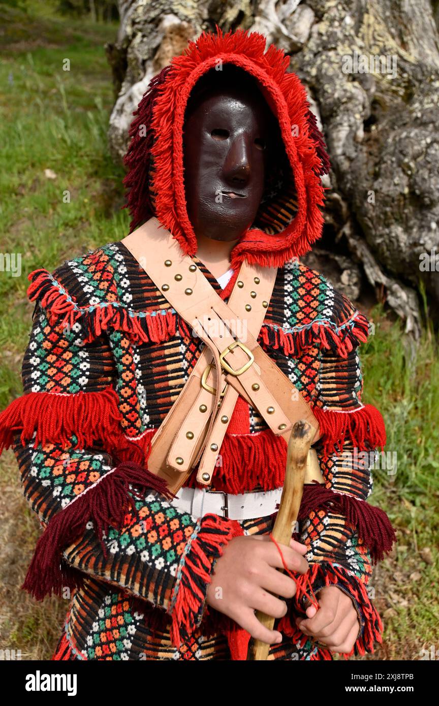The vibrant mask of the Caretos de Podence, originating from the ...