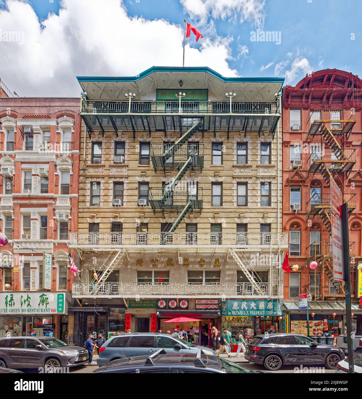 NYC Chinatown: Chinese flags fly at 62-64 Bayard Street, Gee How Oak ...