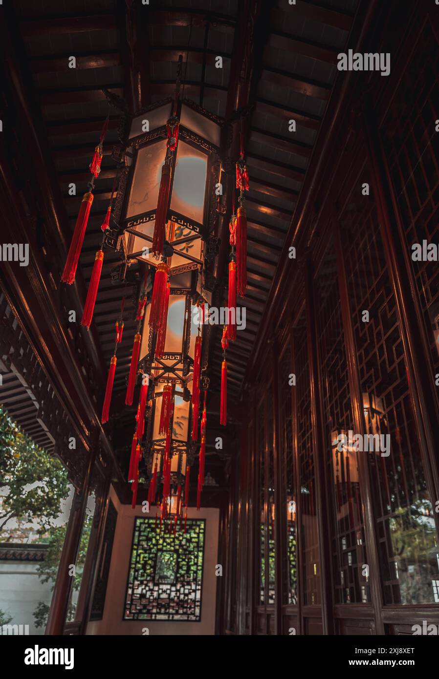 A view of traditional Chinese lanterns hanging from the ceiling of a ...