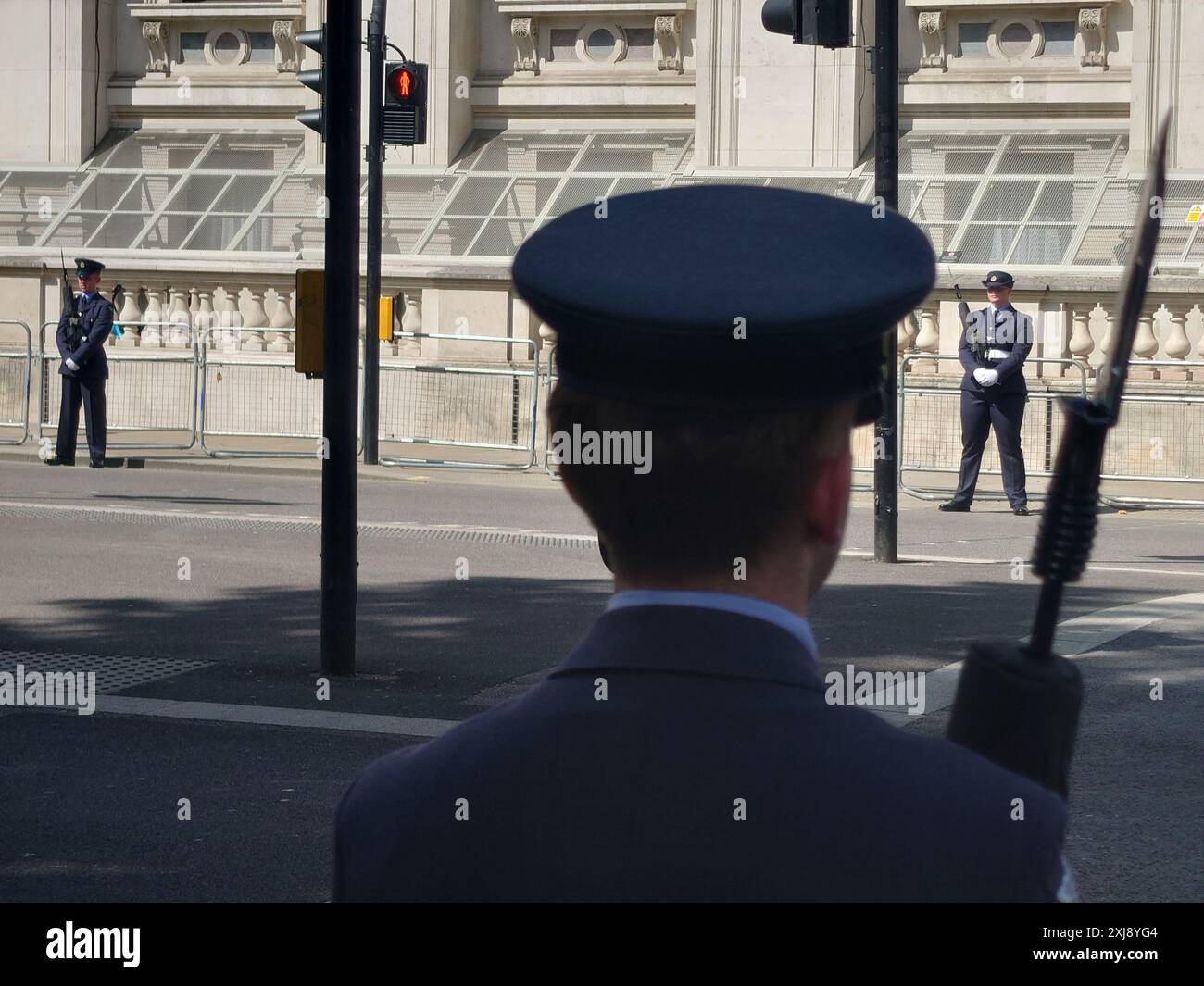 London, UK. 17 July 2024 Onlookers, protestors, and military and police ...