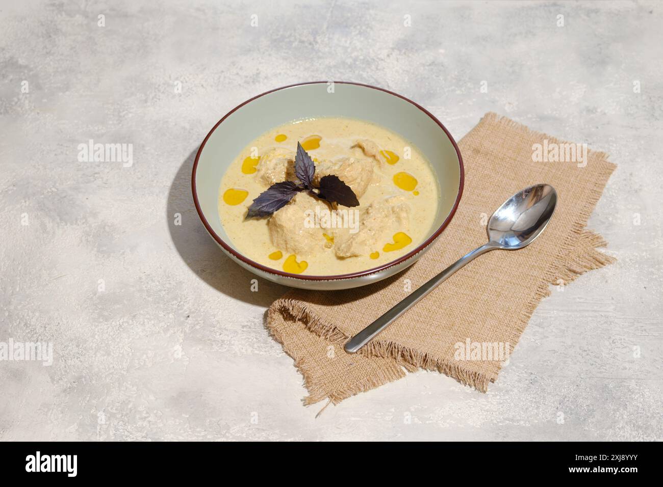Traditional Georgian cold dish satsivi - boiled chicken meat and walnut ...