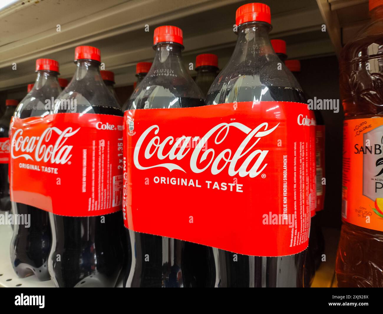 Arco, Italy - July 16, 2024: Coca Cola soft drink bottles displayed on ...