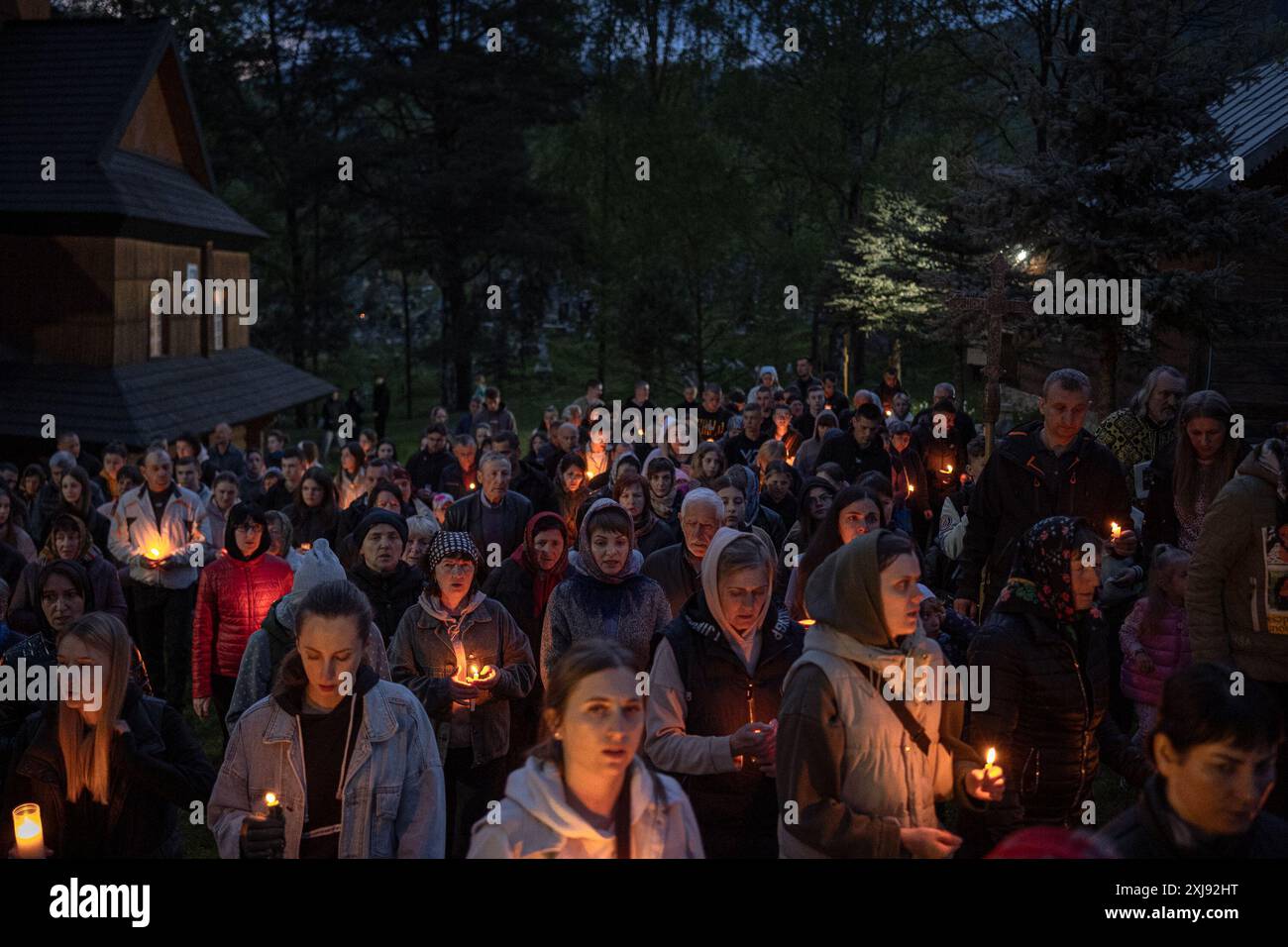 Good Friday evening procession at Kryvoryvnia Orthodox Church. Provody ...