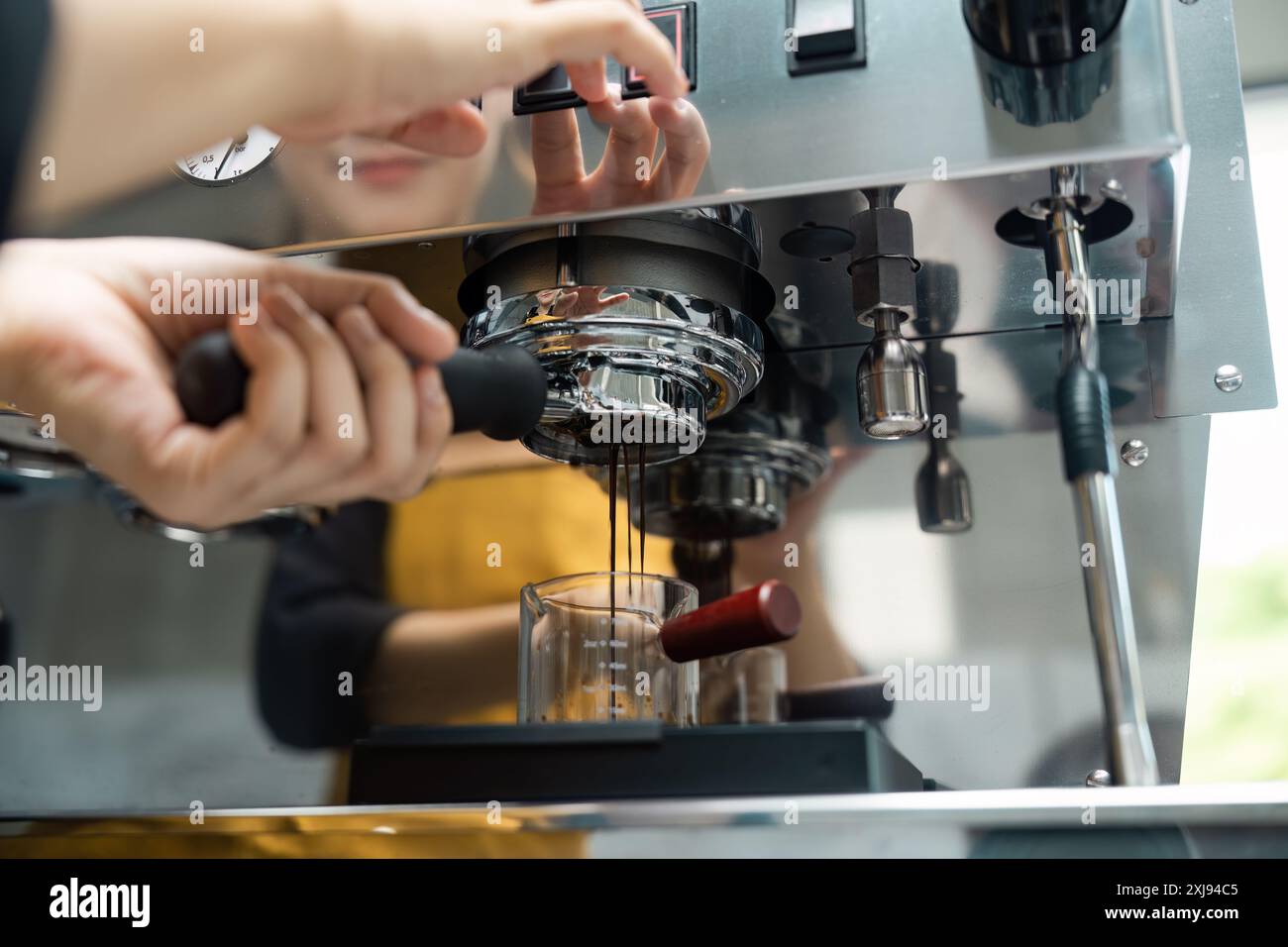 Barista Making Espresso with Professional Coffee Machine in Modern Cafe ...