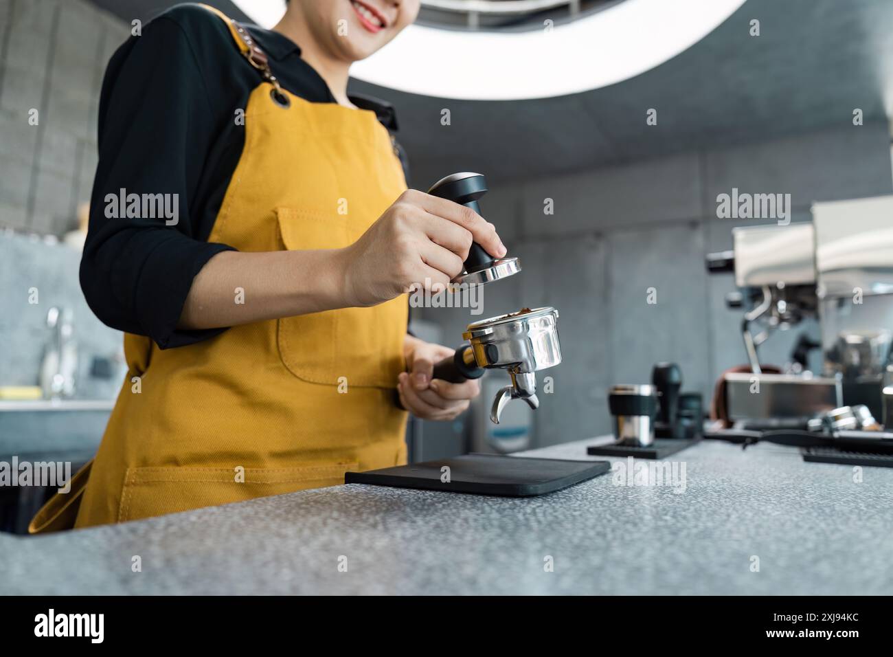 Barista preparation Espresso in Modern Coffee Shop with Professional ...