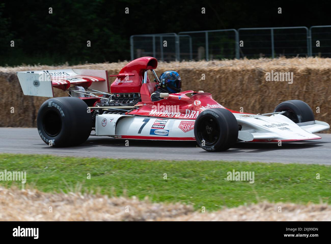 1972 BRM P180 Formula 1 race car driving up the hill climb track at the ...