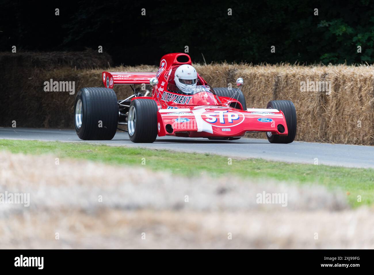 1972 March 721X Formula 1 car driving up the hill climb track at the ...