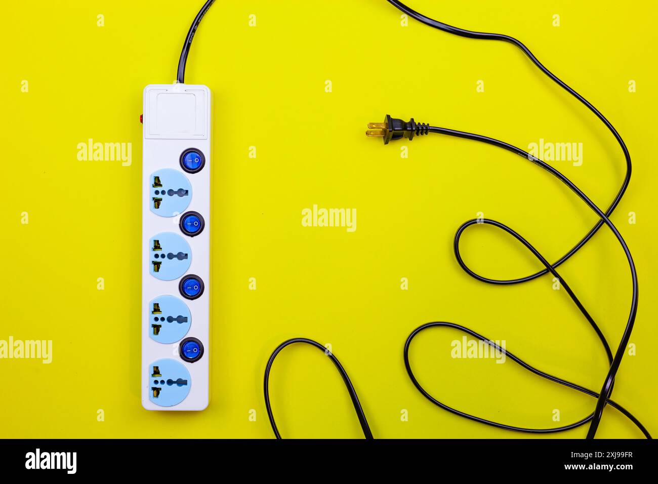 Electric power socket and plug on yellow paper background Stock Photo ...