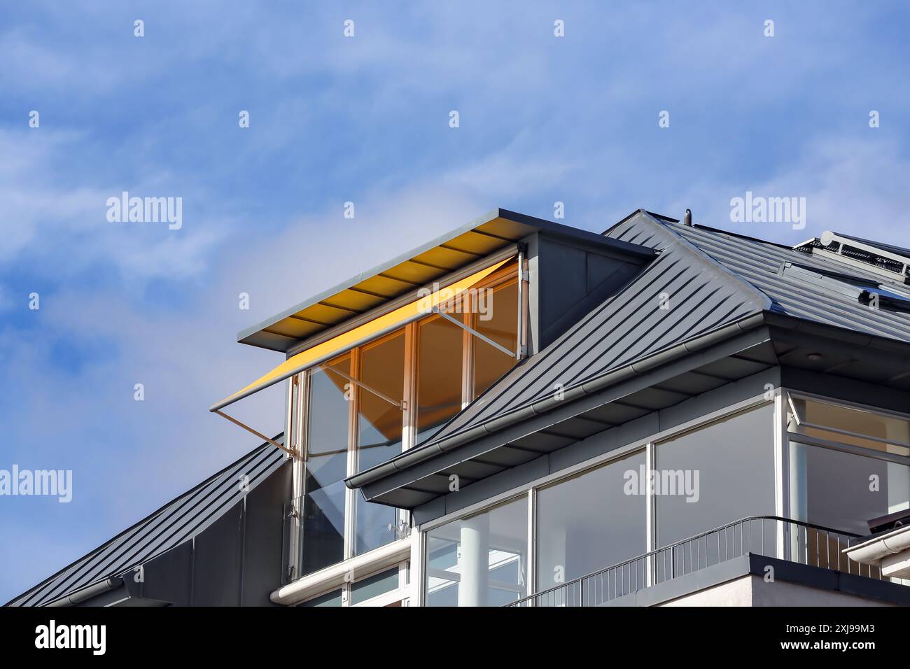 Heat protection for a large dormer window in the attic Stock Photo - Alamy