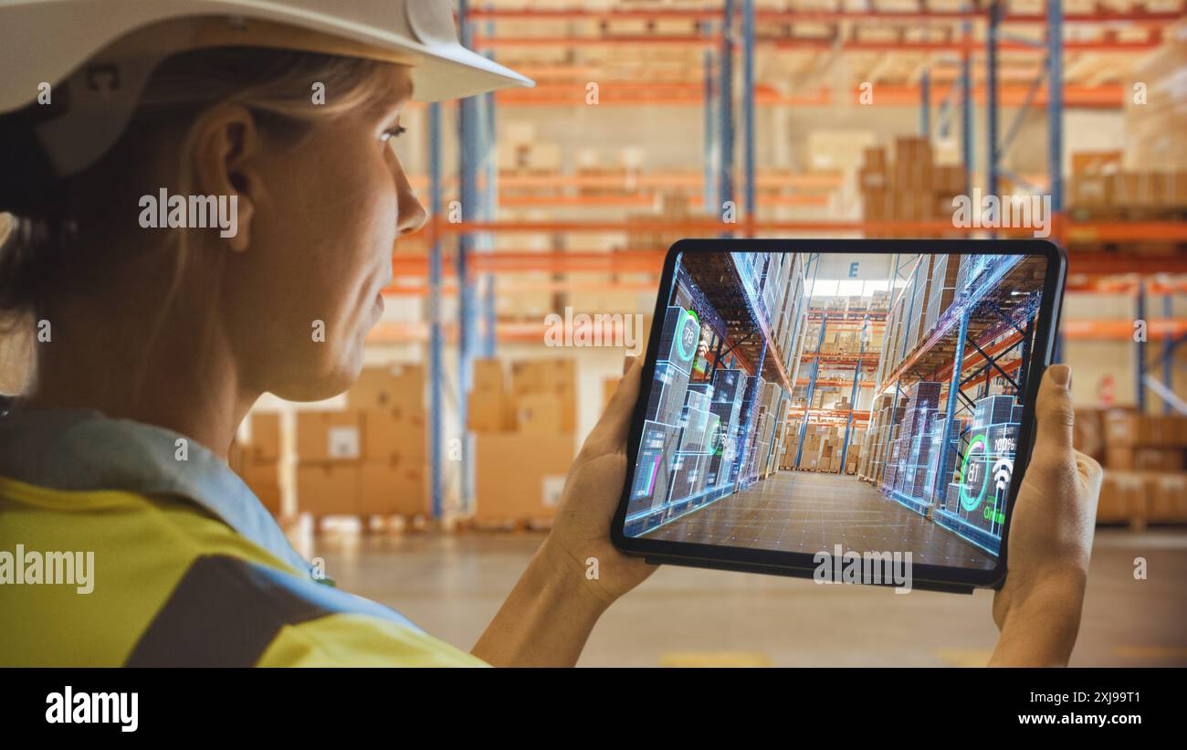 Futuristic Technology Warehouse: Female Worker Doing Inventory, Using ...