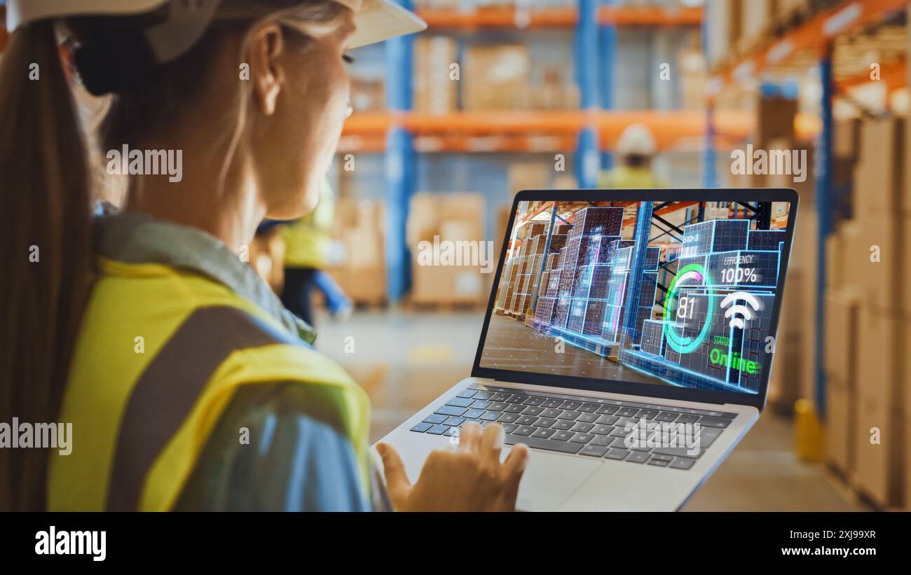 Futuristic Technology Warehouse: Female Worker Doing Inventory, Using ...