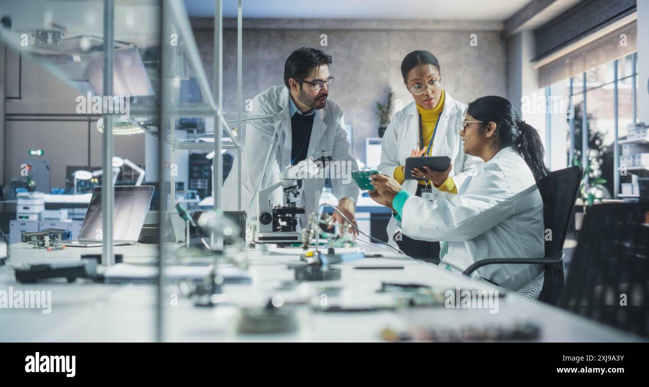 Young Indian Female Having a Conversation with Science Teachers in a ...