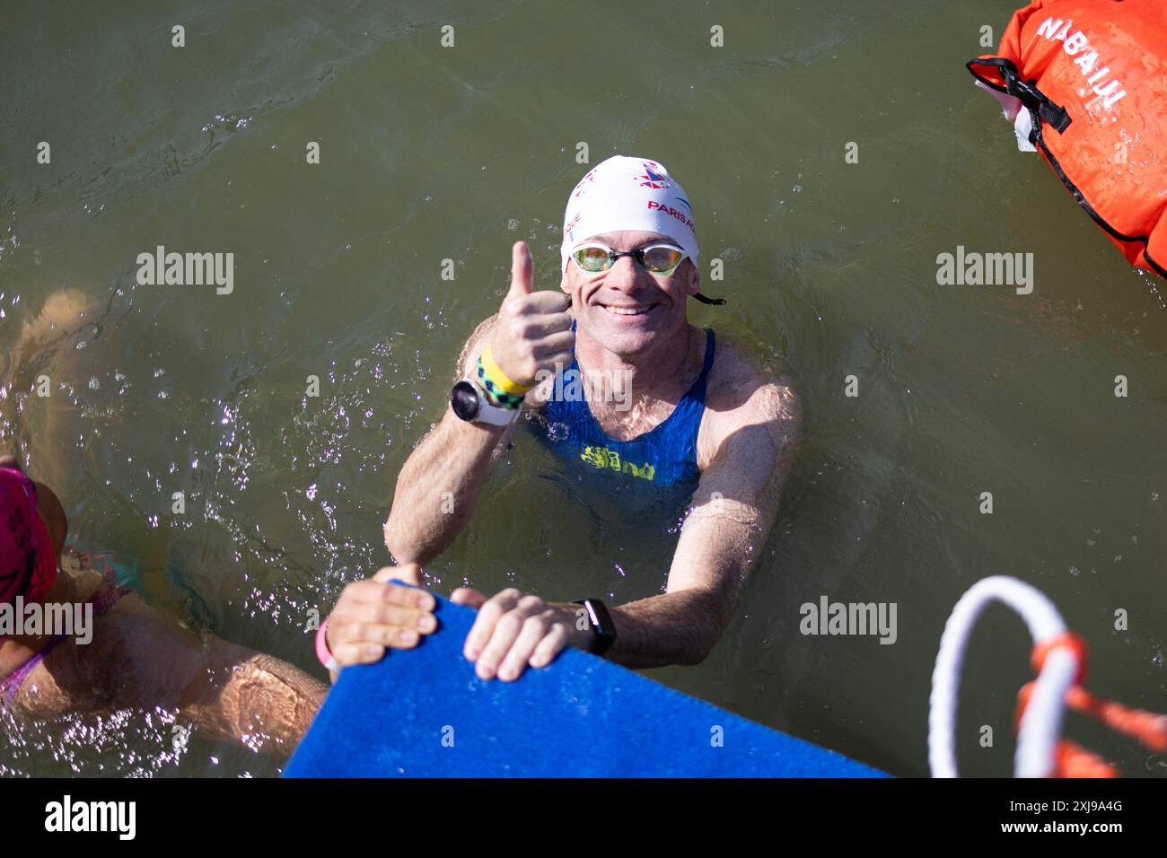 People swimming in the Seine, in Paris on July 17, 2024, after the ...