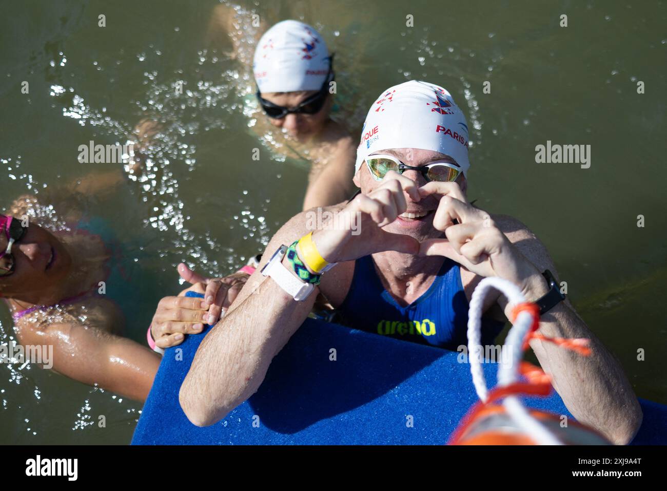People swimming in the Seine, in Paris on July 17, 2024, after the ...