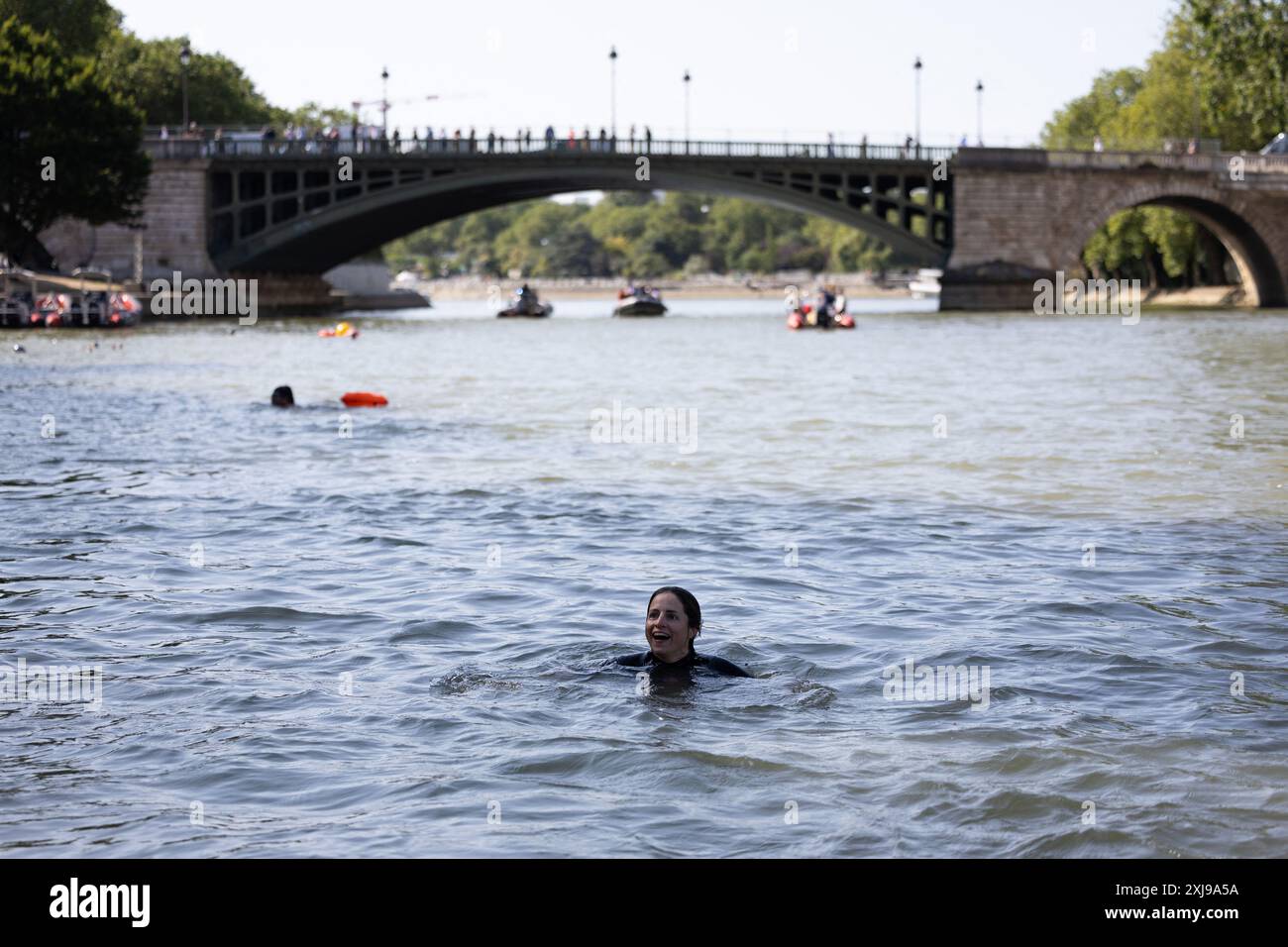 People swimming in the Seine, in Paris on July 17, 2024, after the ...