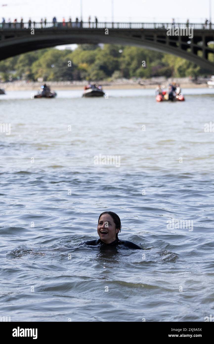 People swimming in the Seine, in Paris on July 17, 2024, after the ...