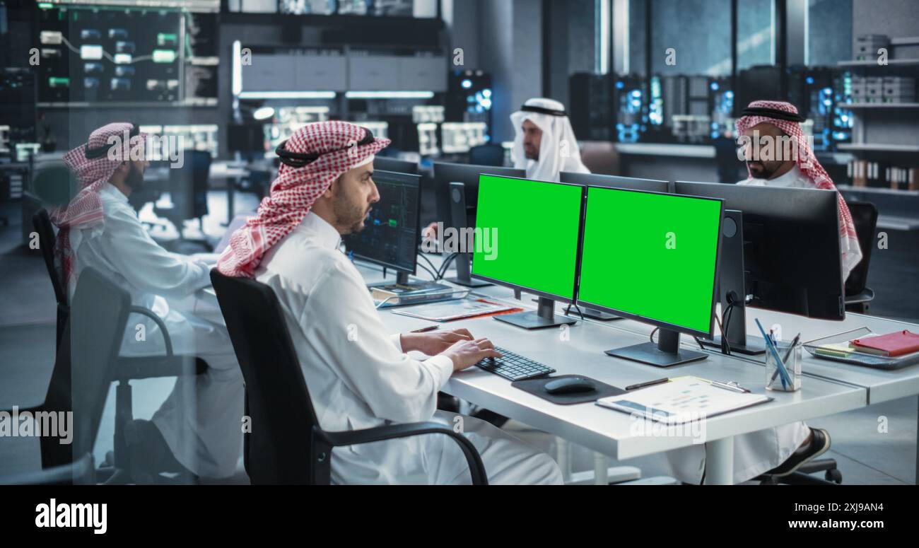 Group of Middle Eastern Muslim Men Working in Research Center ...